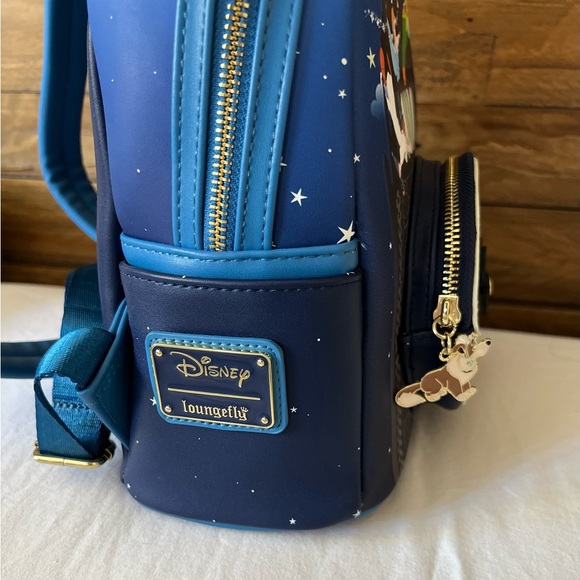 Loungefly | Bags | Disney Loungefly Peter Pan Backpack Glow In The Dark ...